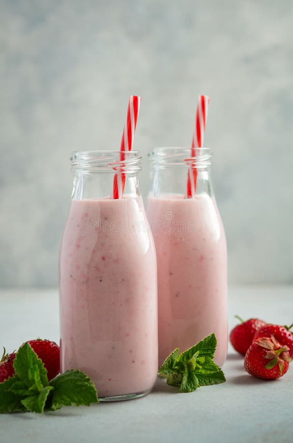 Strawberry Milkshake on a Gray Concrete Background. Stock Photo - Image ...
