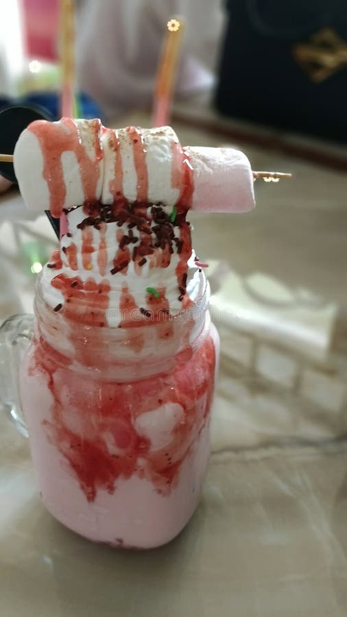 Strawberry Milkshake with Marshmellow and Sprinkle Stock Photo - Image ...
