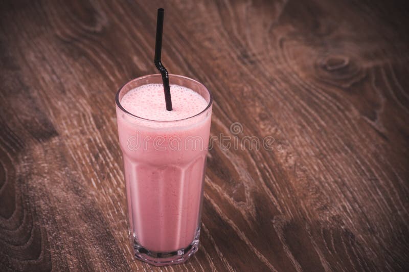 Strawberry Milkshake with Straw in Glass Stock Image - Image of ...