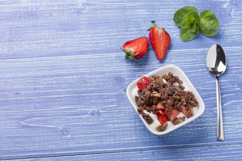 Strawberry Muesli on Blue Wooden Backround Stock Photo - Image of ...