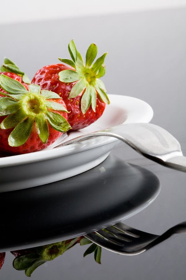 Strawberry and plate stock photo. Image of berries, strawberries - 23611722