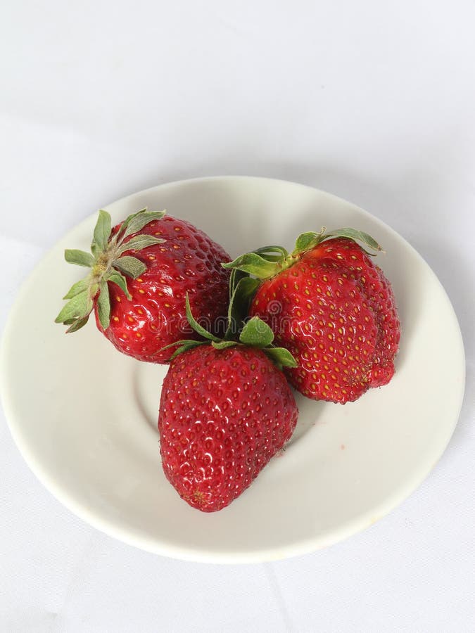 Strawberry on a plate stock photo. Image of strawberries - 54225422