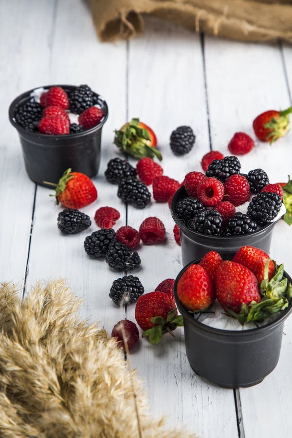 Strawberry Raspberry Blackberry on White Table Stock Image - Image of ...