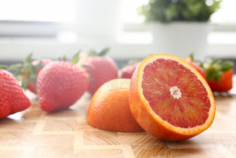 Strawberry and Red Orange on Kitchen Table Stock Image - Image of diet ...