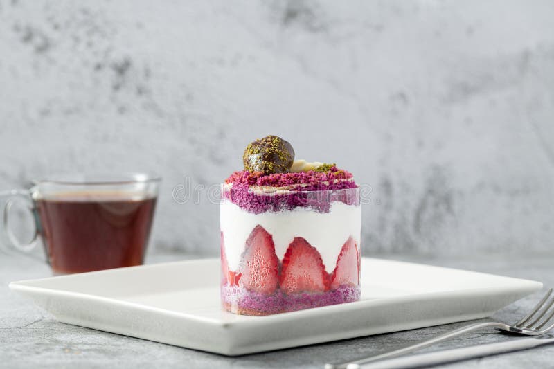 Strawberry Shortcake with Tea on a White Porcelain Plate Stock Photo ...