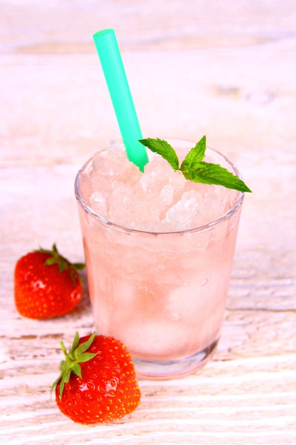 Strawberry Slush in Glass with Straw on Blue Background Stock Image ...