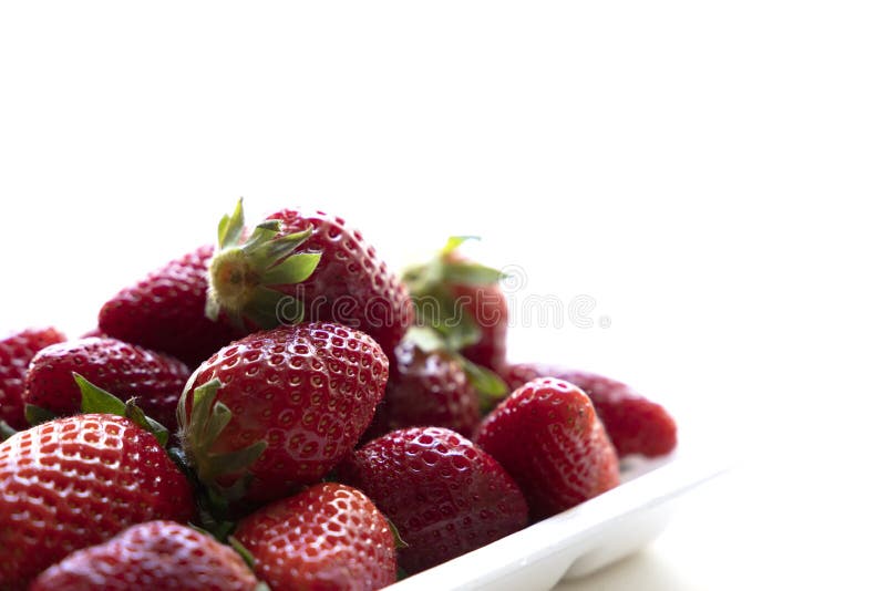 Strawberry Tray in One Corner with White Background Stock Photo - Image ...