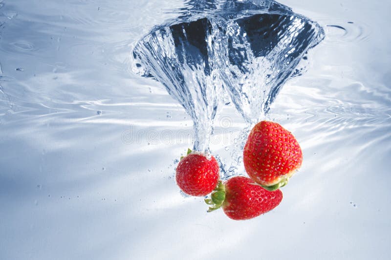 Strawberry in water stock photo. Image of isolated, blue - 9164690