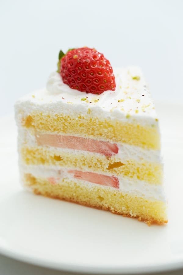 Strawberry Whipped Cream Slice Cake on a Plate Stock Photo - Image of ...