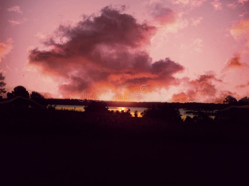 Strawberry wine clouds stock photo. Image of reflection - 258530946