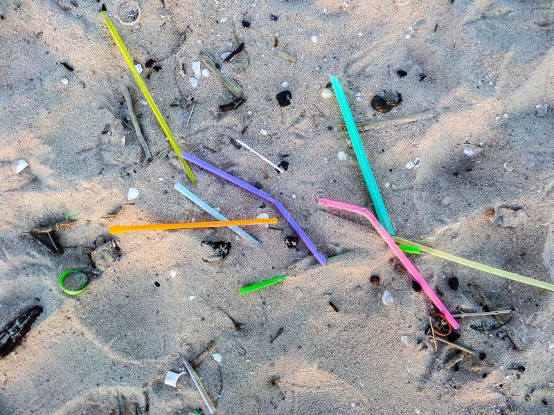 Straws are waste on beach stock photo. Image of disposal - 57577738