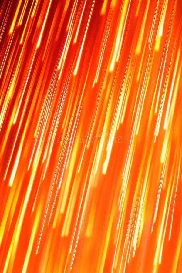 Streaks of Light Fall on Orange Background Creating a Fiery Visual ...