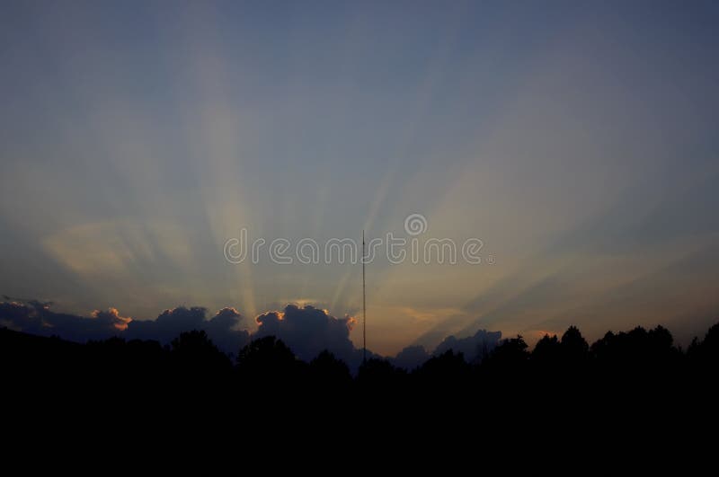 Streaks of Light from a Setting Sun Stock Photo - Image of sunrise ...