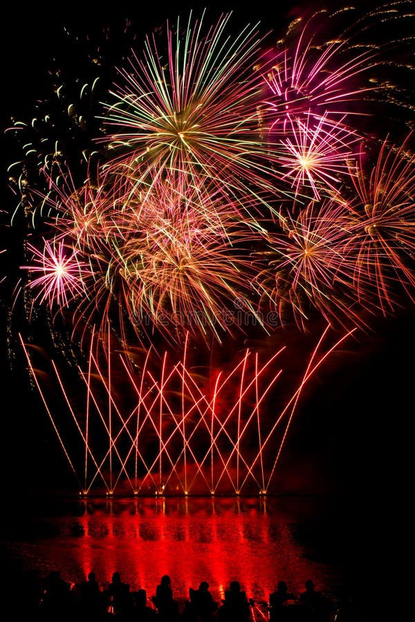 Streaks of Red Fireworks stock photo. Image of flash - 33332288