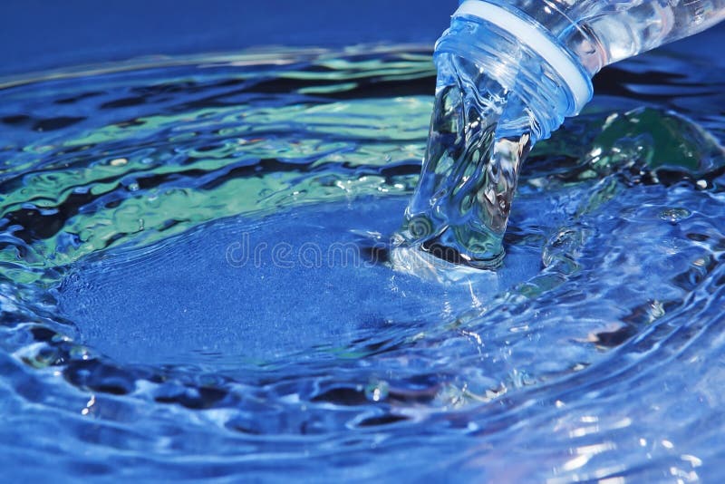 Fresh Water Poured into Pond and Creating Ripples Stock Image - Image ...