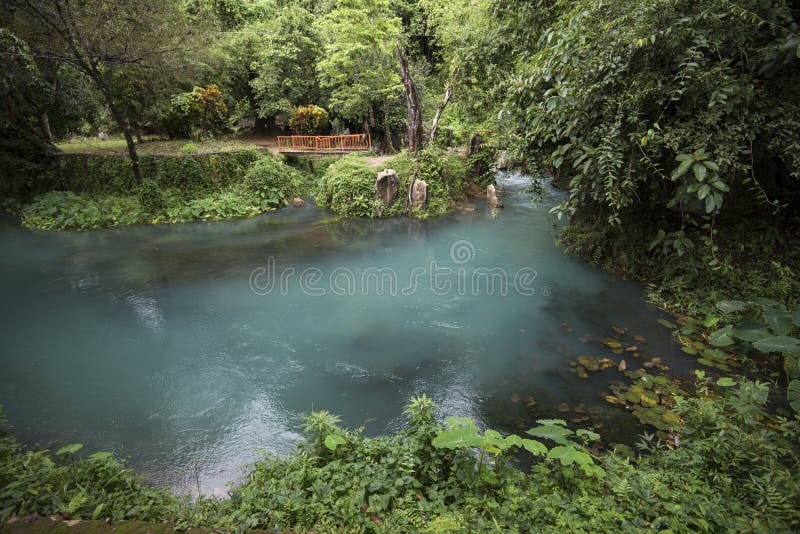 Stream in blue basalt stock image. Image of river, clouds - 83284341