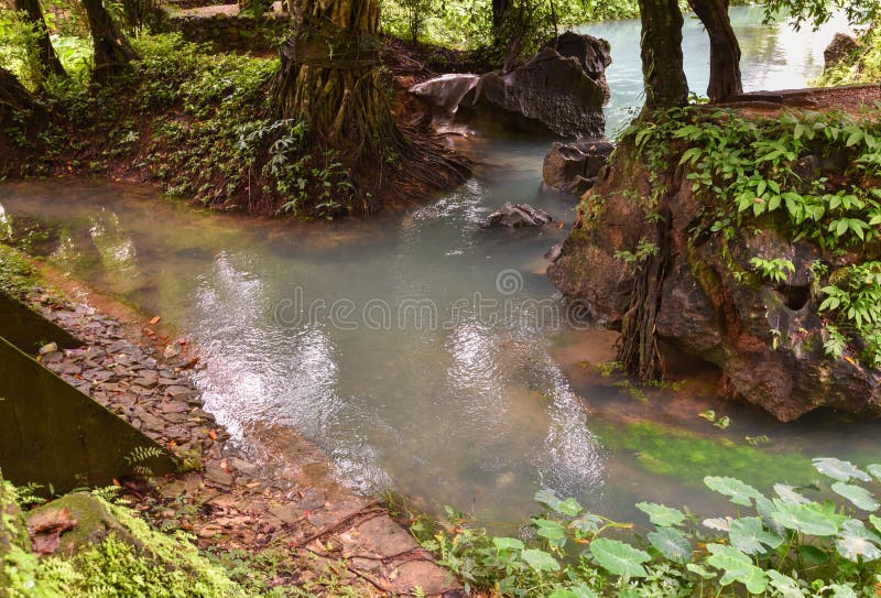 Stream in blue basalt stock image. Image of river, clouds - 83284341
