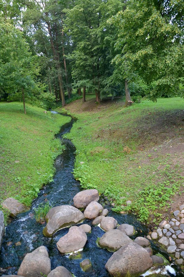 Stream with Boulders in Park Stock Photo - Image of lawn, country: 70121620