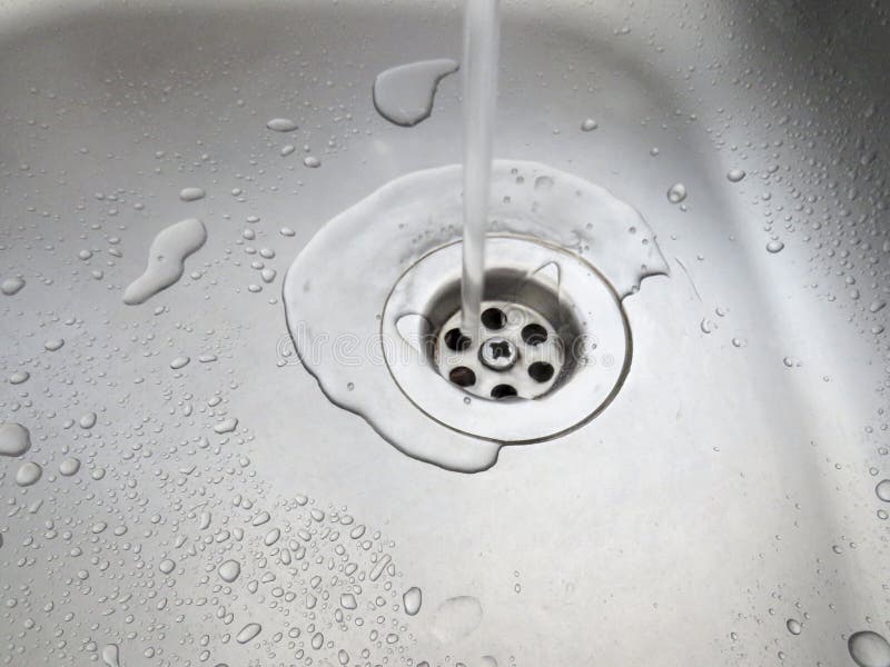 A Stream of Clean Water Flows into the Sink Stock Photo - Image of ...