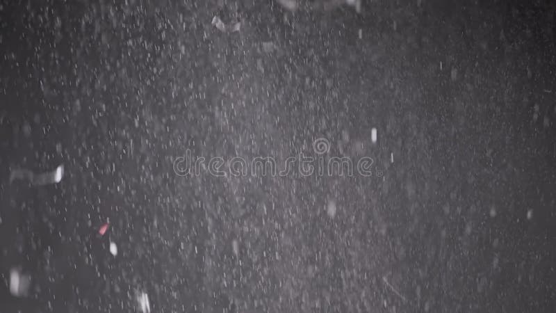 Stream of Falling Confetti, Dust Particles, and Snowfall on Black ...