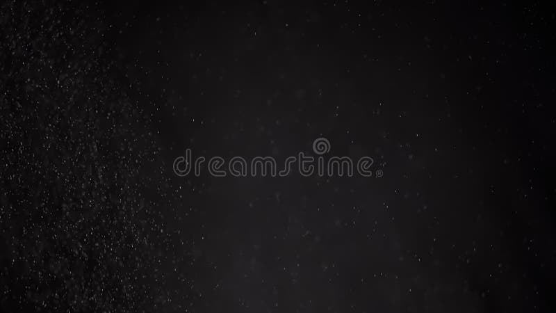 Stream of Falling Mixed Particles of Dust, Debris, Powder on Black ...