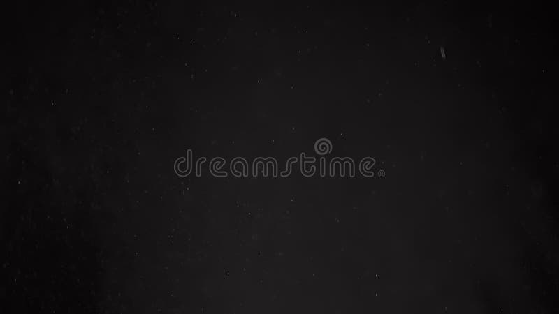 Stream of Falling Mixed Particles of Dust, Debris, Powder on Black ...