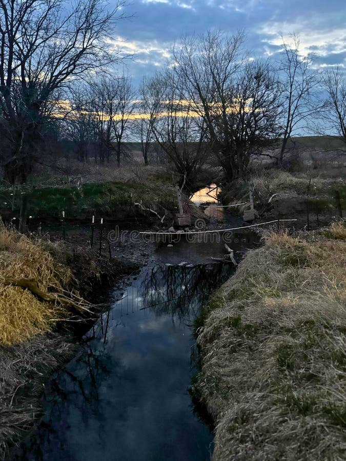 Stream in a Field at Sunset in the Midwest in the Spring. Stock Photo ...