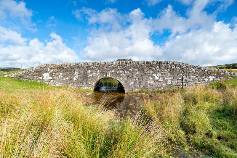 Stream Flowing Under a Bridge Stock Photo - Image of nature, granite ...