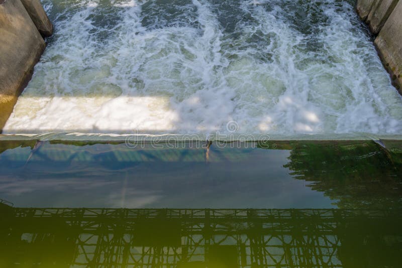 Stream Flowing through a Weir in Sunlight Stock Image - Image of ...