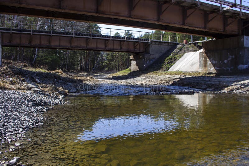 The Stream Flows Under the Railway Bridge Stock Photo - Image of ...