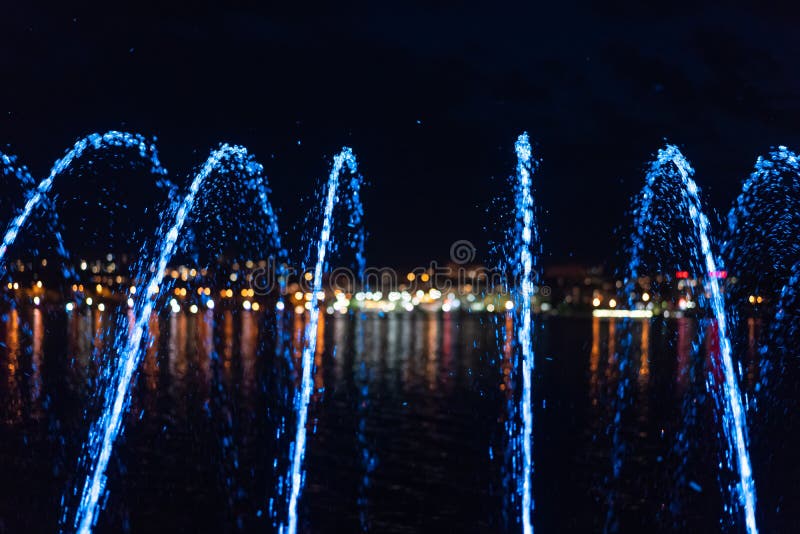 A Stream of a Fountain. Evening City. Stock Photo - Image of light ...