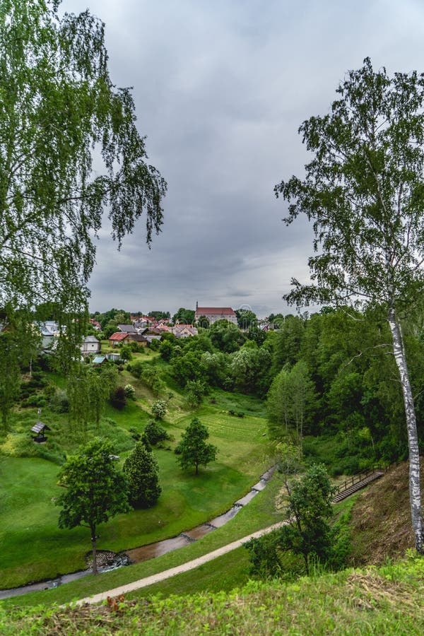 Stream on a Hill with a Wide Green Field Stock Photo - Image of ...