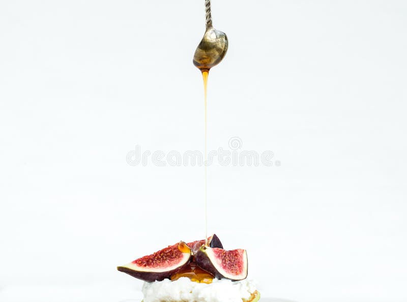 A Stream of Honey Falling Down To the Cake Top Stock Photo - Image of ...