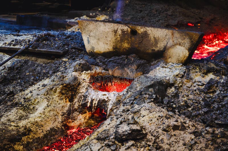 A Stream of Hot Metal, Molten Steel Flowing Along a Guide Chute. Stock ...