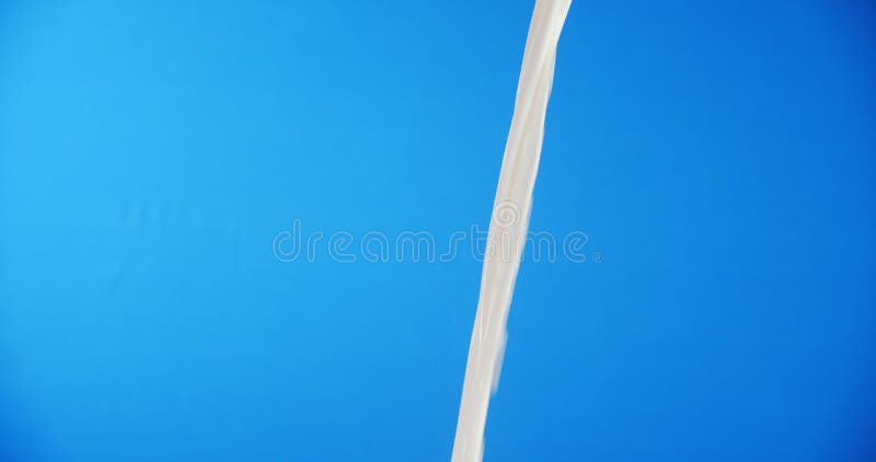 Splashes of Milk, Stream Jet of Milk Pours Pouring into a Can of Milk ...