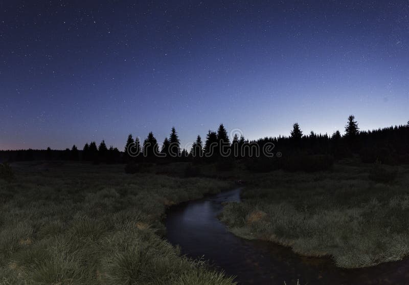 Stream at night stock photo. Image of light, dawn, star - 222801446