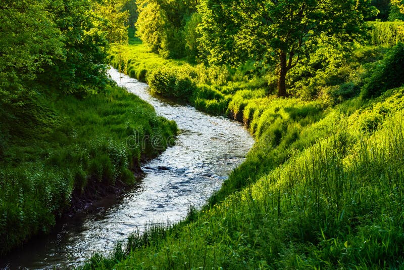 A Stream in a Park at Sunset. Stock Photo - Image of beautiful, travel ...