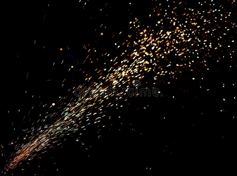 A Stream of Sparks is Shooting Out from a Fire Stock Photo - Image of ...