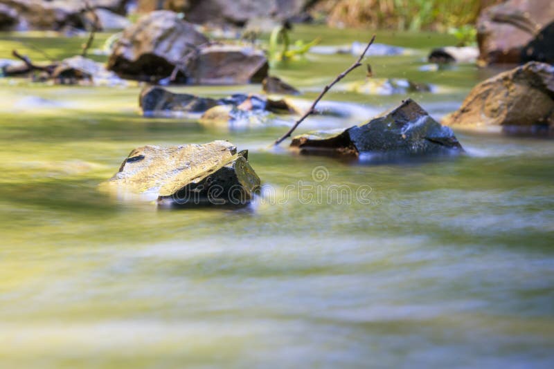 The Stream Washes Stones Shot with Slow Shutter Speed Stock Image ...