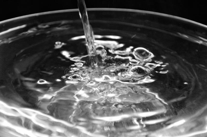 Stream of Water on a Black Background Stock Image - Image of fluid ...