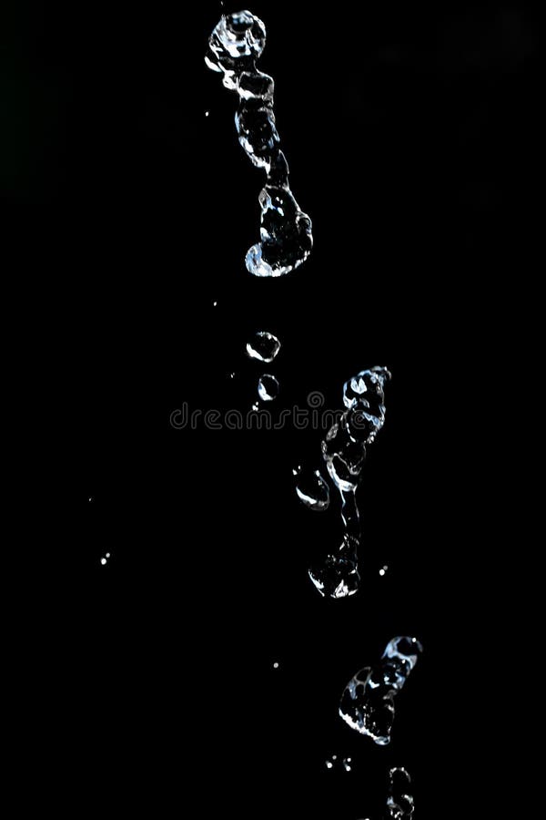 Stream of Water on a Black Background Stock Photo - Image of fall ...