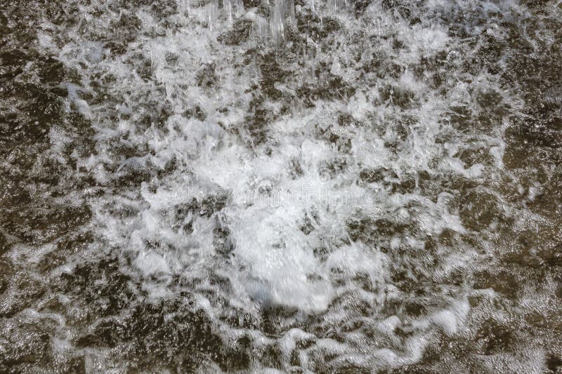 Stream of Water Falling into Water Basin of a Fountain Stock Photo ...