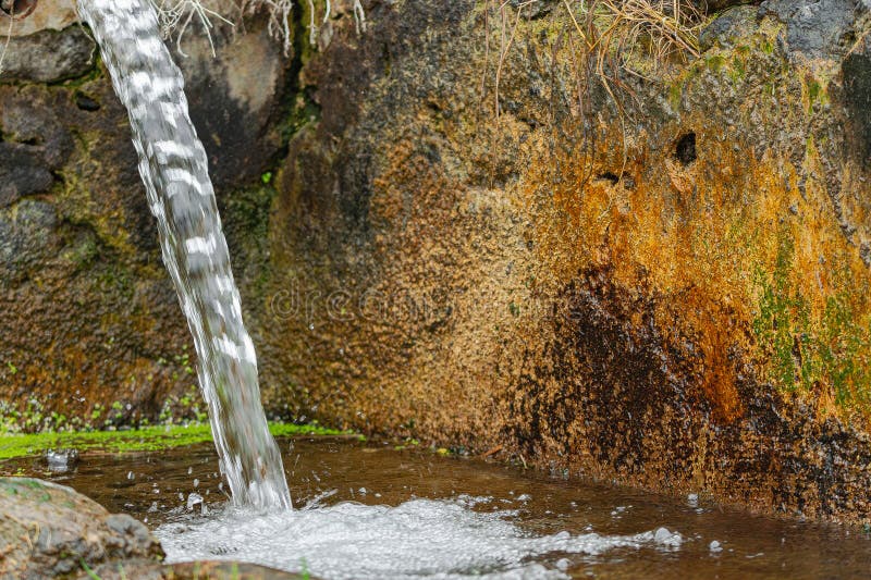 Stream of Water Falling into a Stone Tank Stock Image - Image of moss ...
