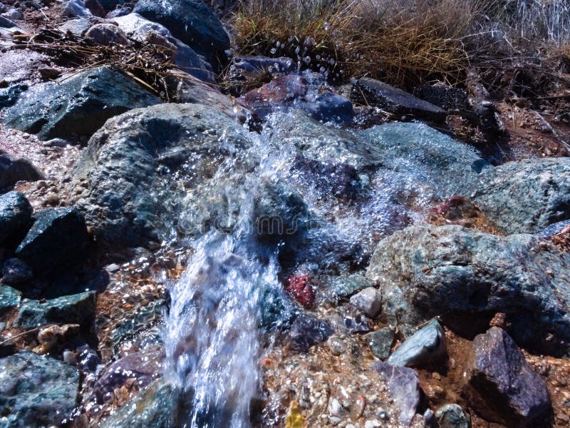 Stream of Water Flowing Down Rocks Stock Photo - Image of splashes ...