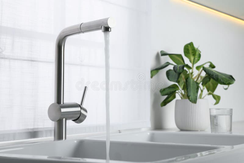 Stream of Water Flowing from Tap in Kitchen Stock Photo - Image of ...
