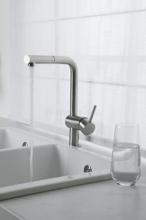 Stream of Water Flowing from Tap in Kitchen Stock Image - Image of ...