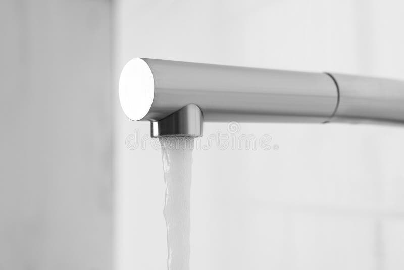 Stream of Water Flowing from Tap on White Background, Closeup Stock ...
