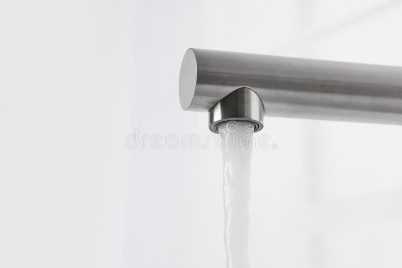 Stream of Water Flowing from Tap on White Background, Closeup. Space ...