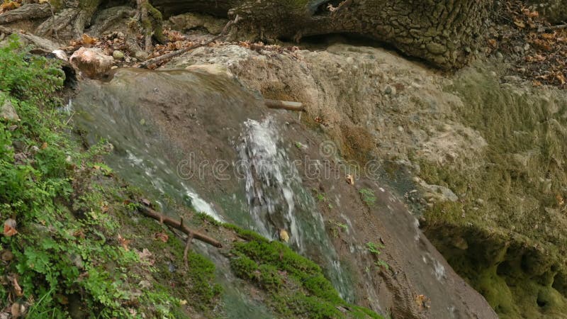 A Stream of Water Flows Down a Rocky Hillside Stock Footage - Video of ...