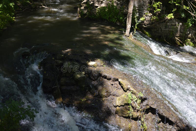 The Stream of Water Flows Down the Slope Stock Photo - Image of scenic ...